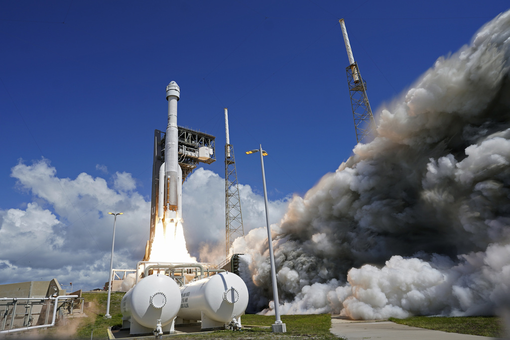Boeing’s space capsule springs more helium leaks on its first test ...